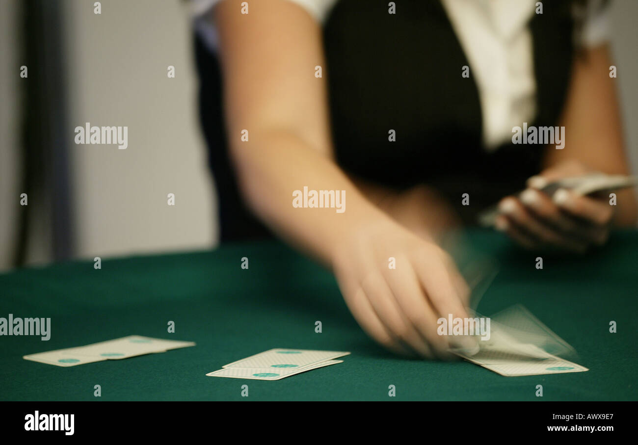 Dealing cards in motion Stock Photo - Alamy