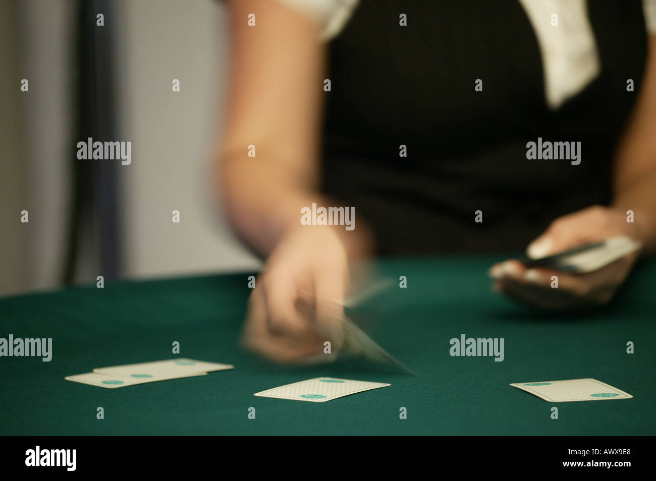 Dealing cards in motion Stock Photo - Alamy