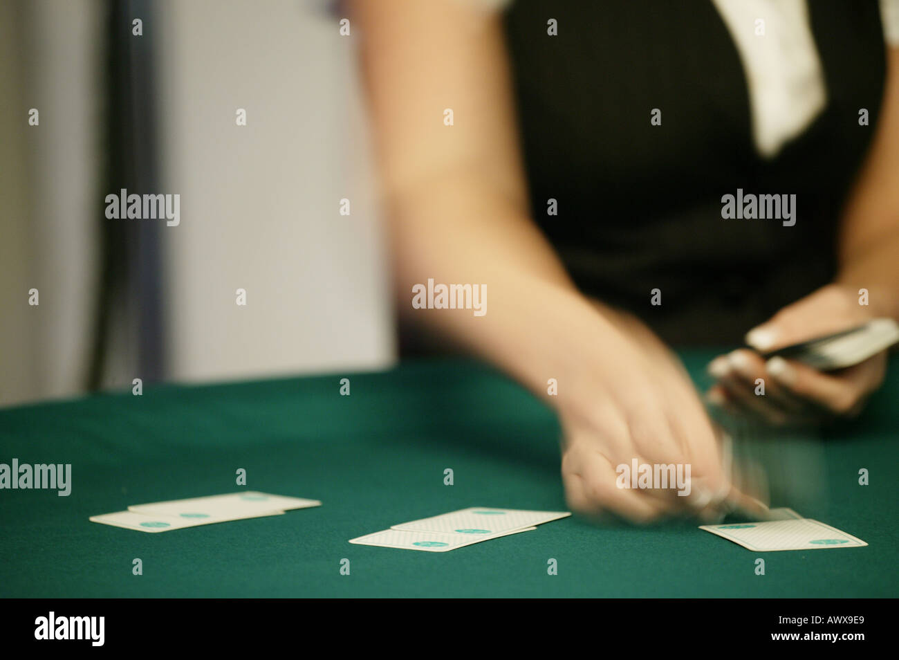 Dealing cards in motion Stock Photo - Alamy