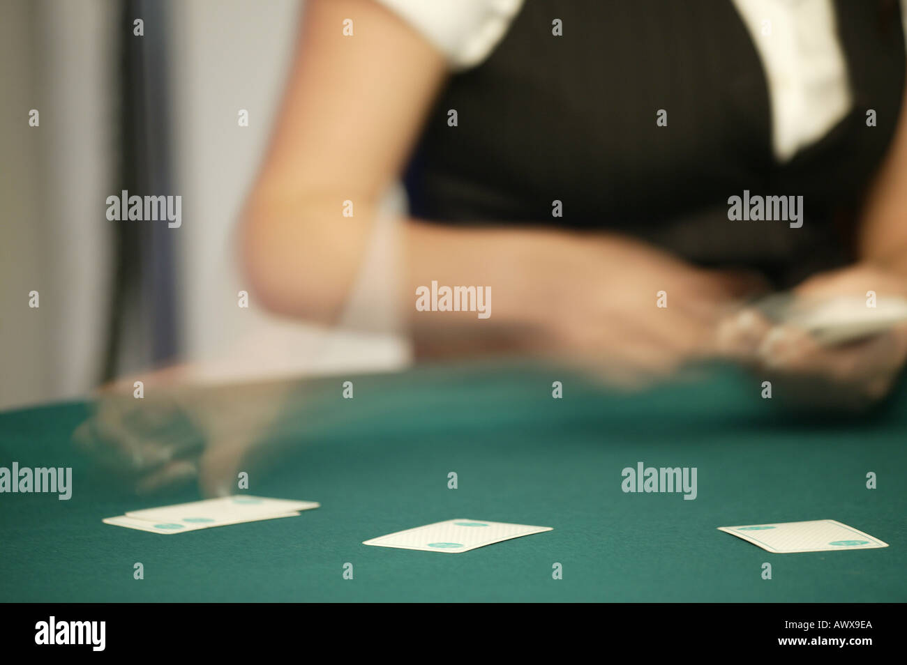 Dealing cards in motion Stock Photo - Alamy