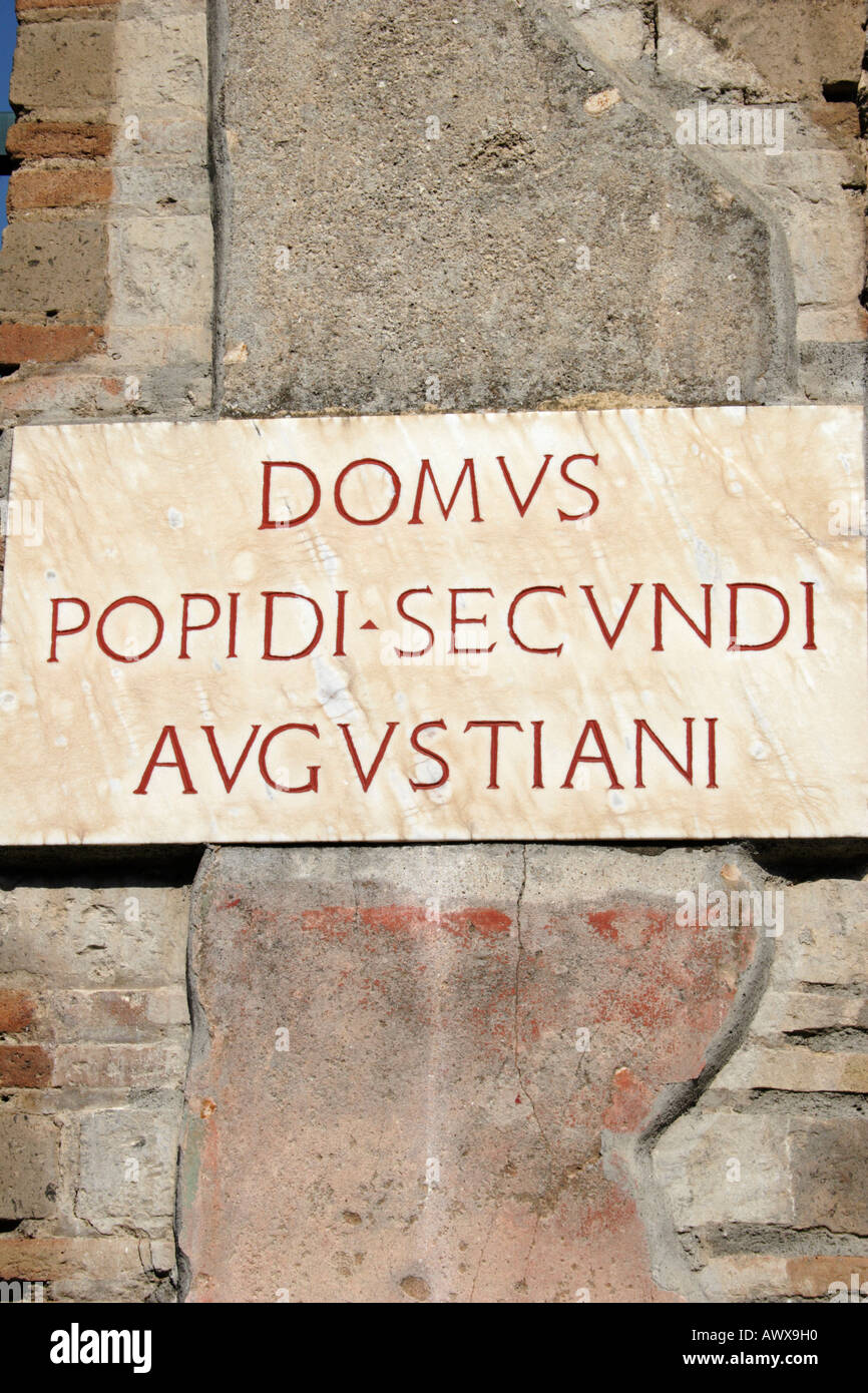 Wall sign in Pompeii, Italy Stock Photo - Alamy