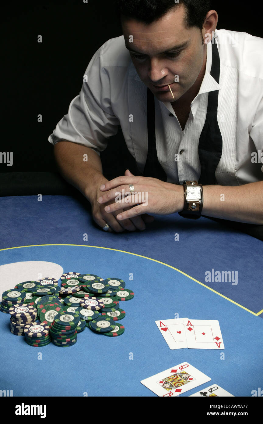 Guys playing poker hi-res stock photography and images - Alamy