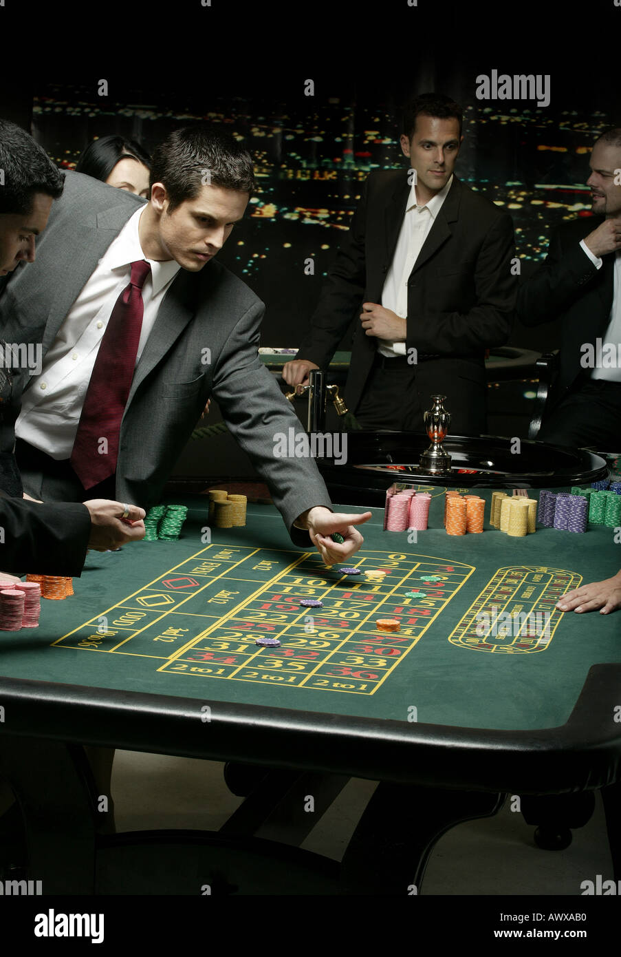Man placing bet roulette table hi-res stock photography and images - Alamy