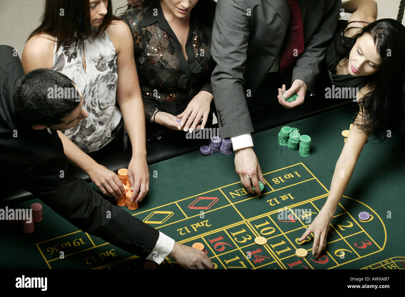 People around a roulette table Stock Photo - Alamy
