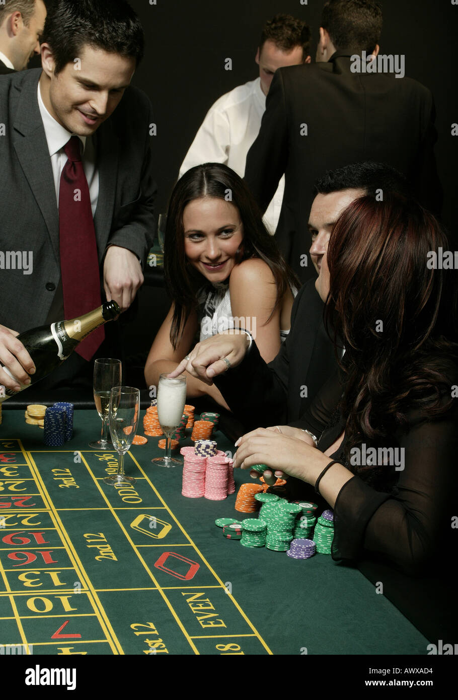 Couple at the roulette table Stock Photo - Alamy