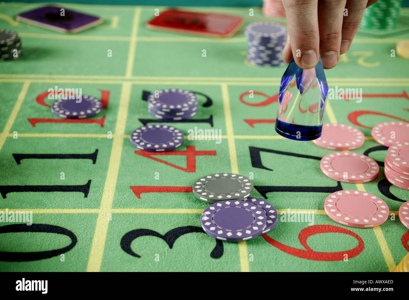 Roulette chips and dolly Stock Photo - Alamy