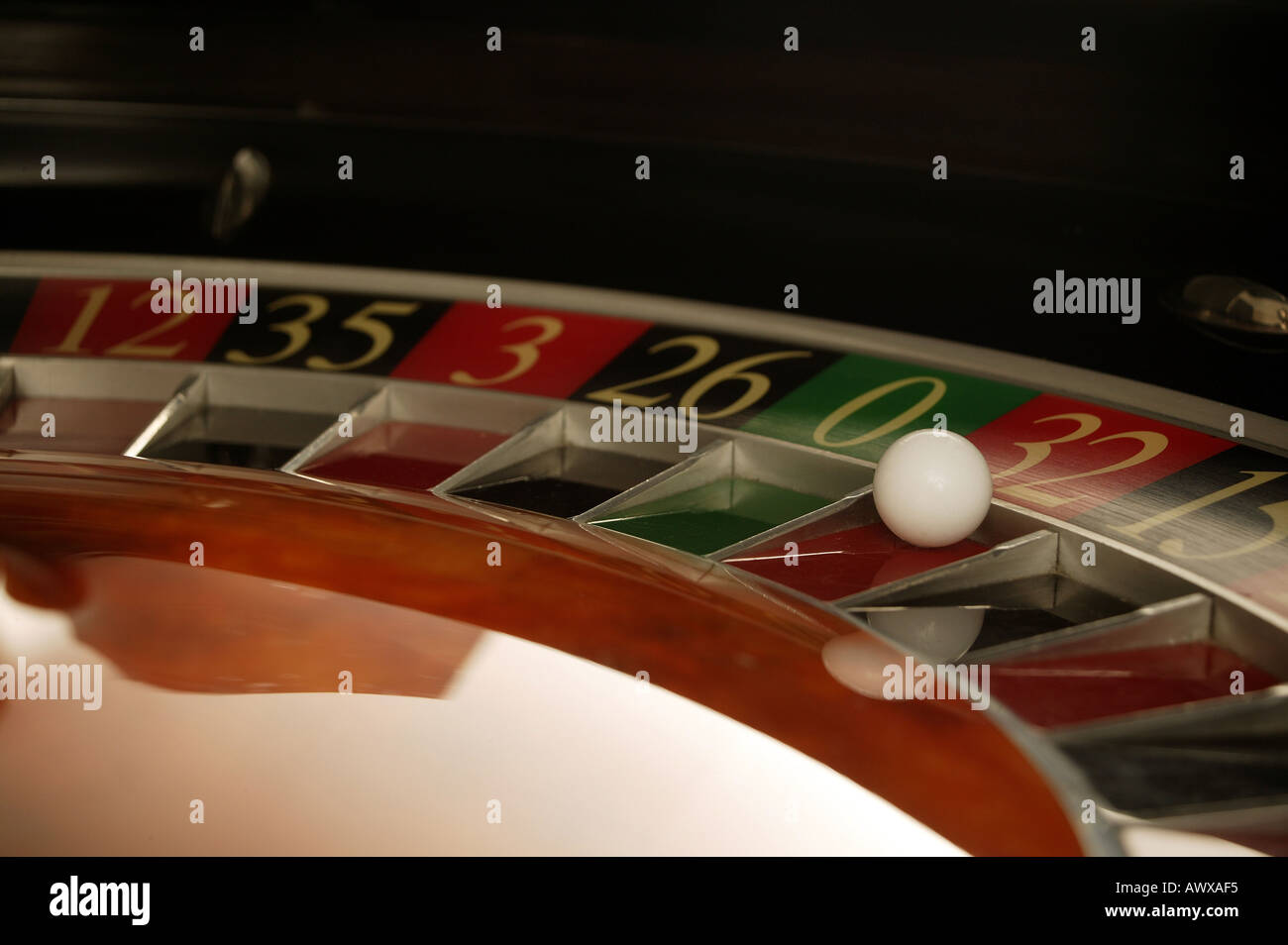 Roulette wheel and ball Stock Photo - Alamy
