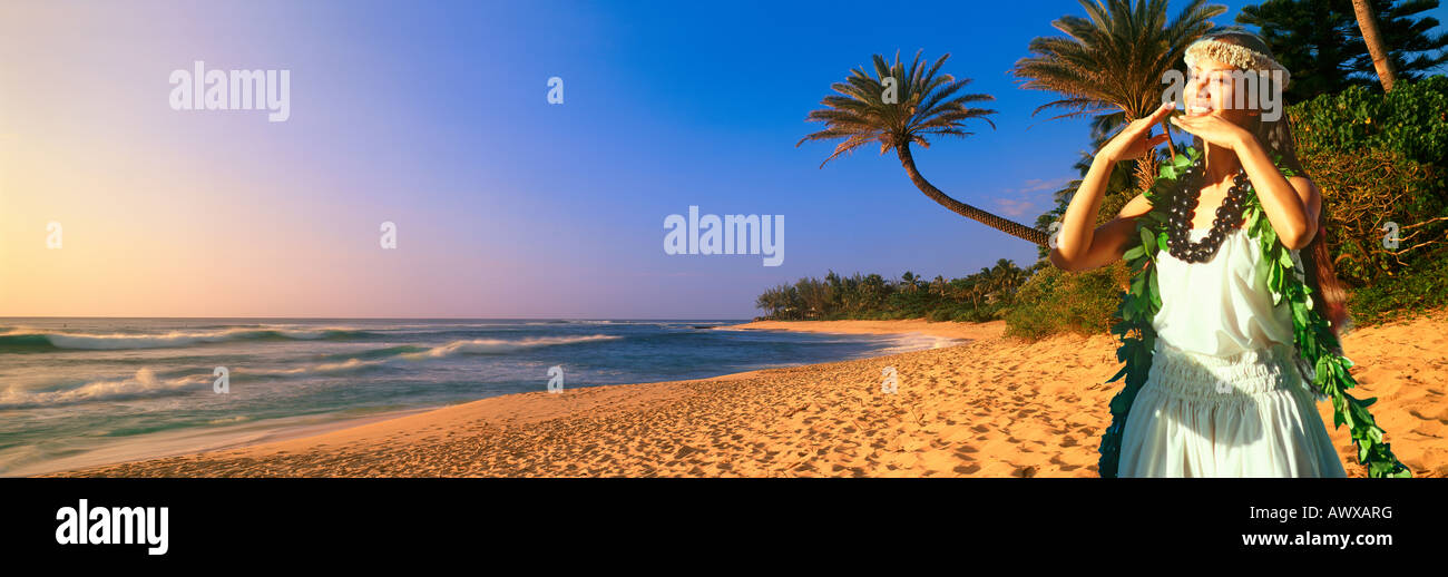 Composite panoramic image of Hawaiian native dancer and coastline in ...