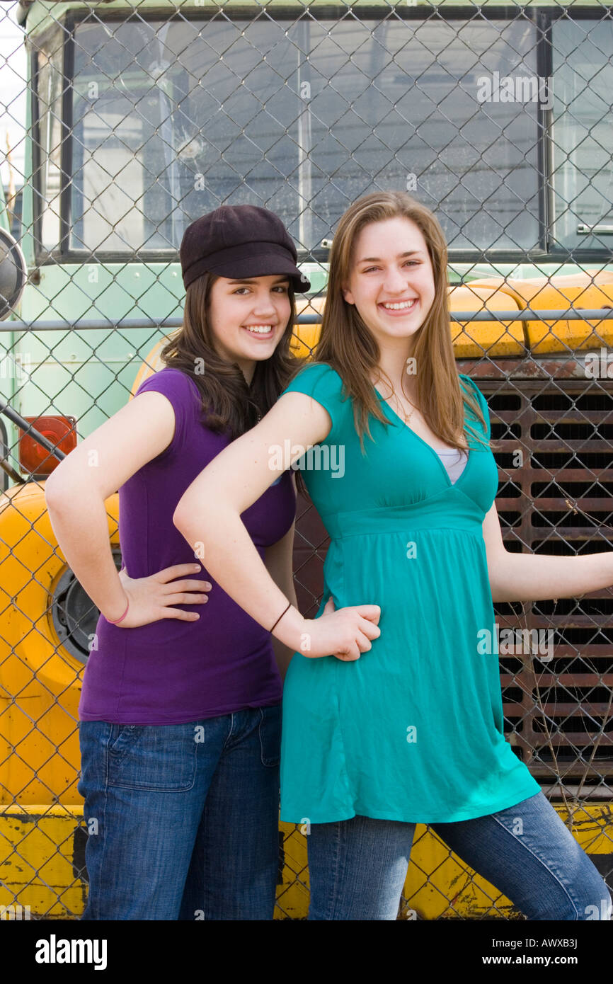 Two Girls by Bus Stock Photo - Alamy
