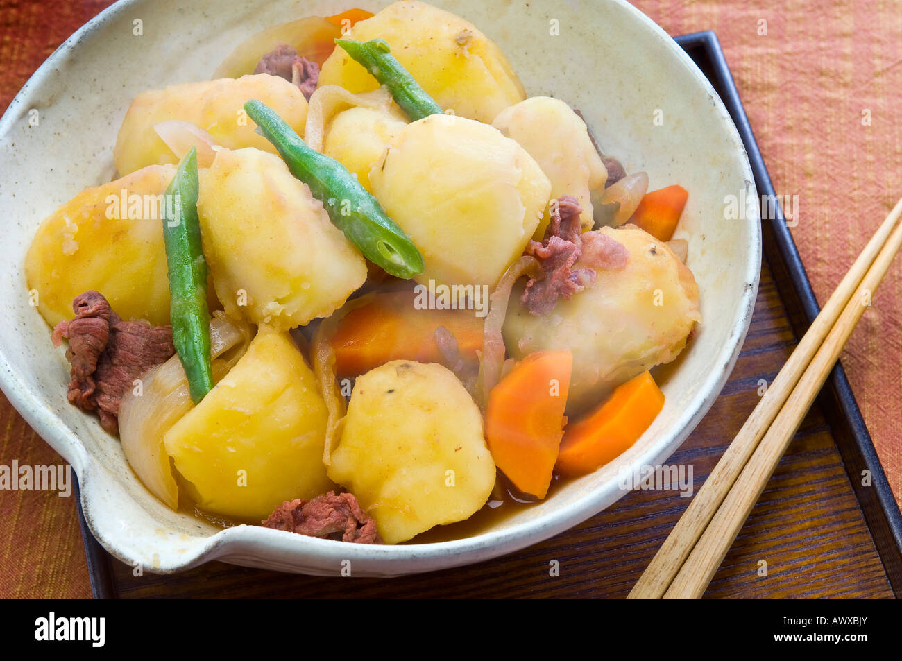 Beef & poteto in broth Stock Photo - Alamy