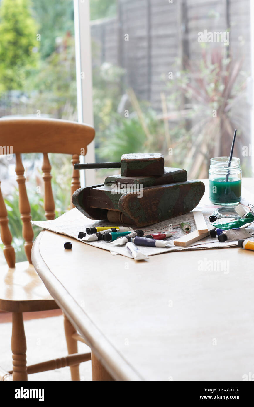Tank model and painting equipment on table, close-up Stock Photo - Alamy