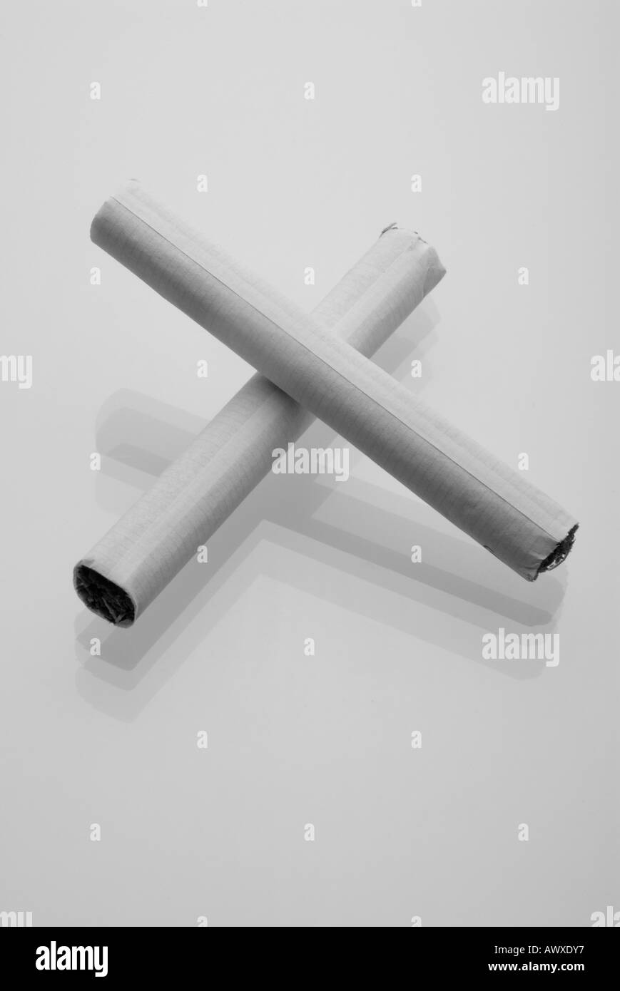 Two cigarettes crossed Stock Photo - Alamy