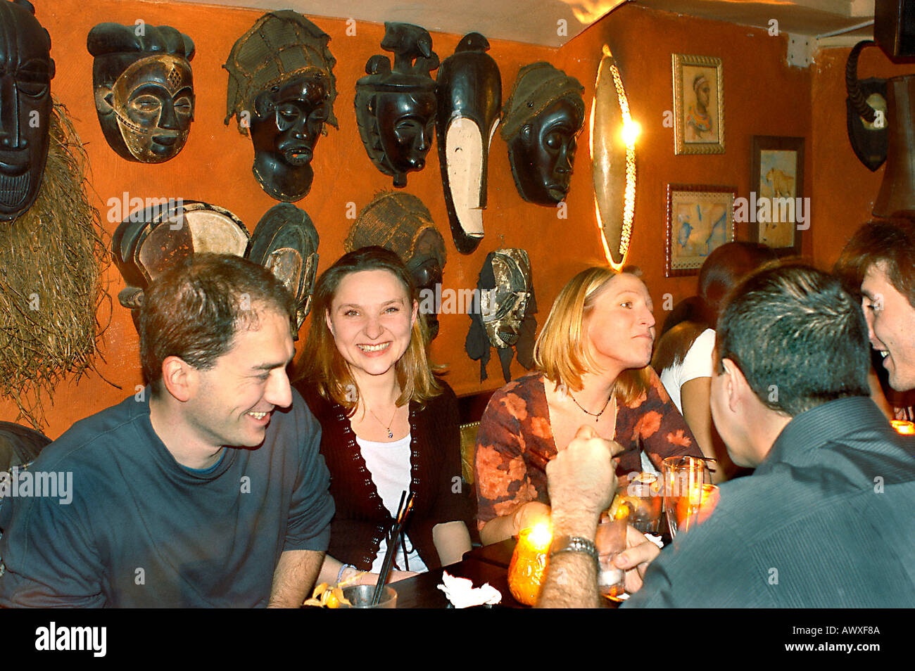 PARIS France, Group Young Adults Friends, Chatting in African Theme ...