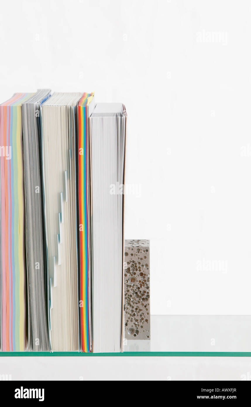 Paper stationery on glass shelf, studio shot Stock Photo - Alamy