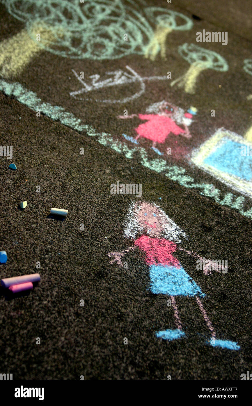 childs chalk drawing of a girl on pavement Stock Photo - Alamy