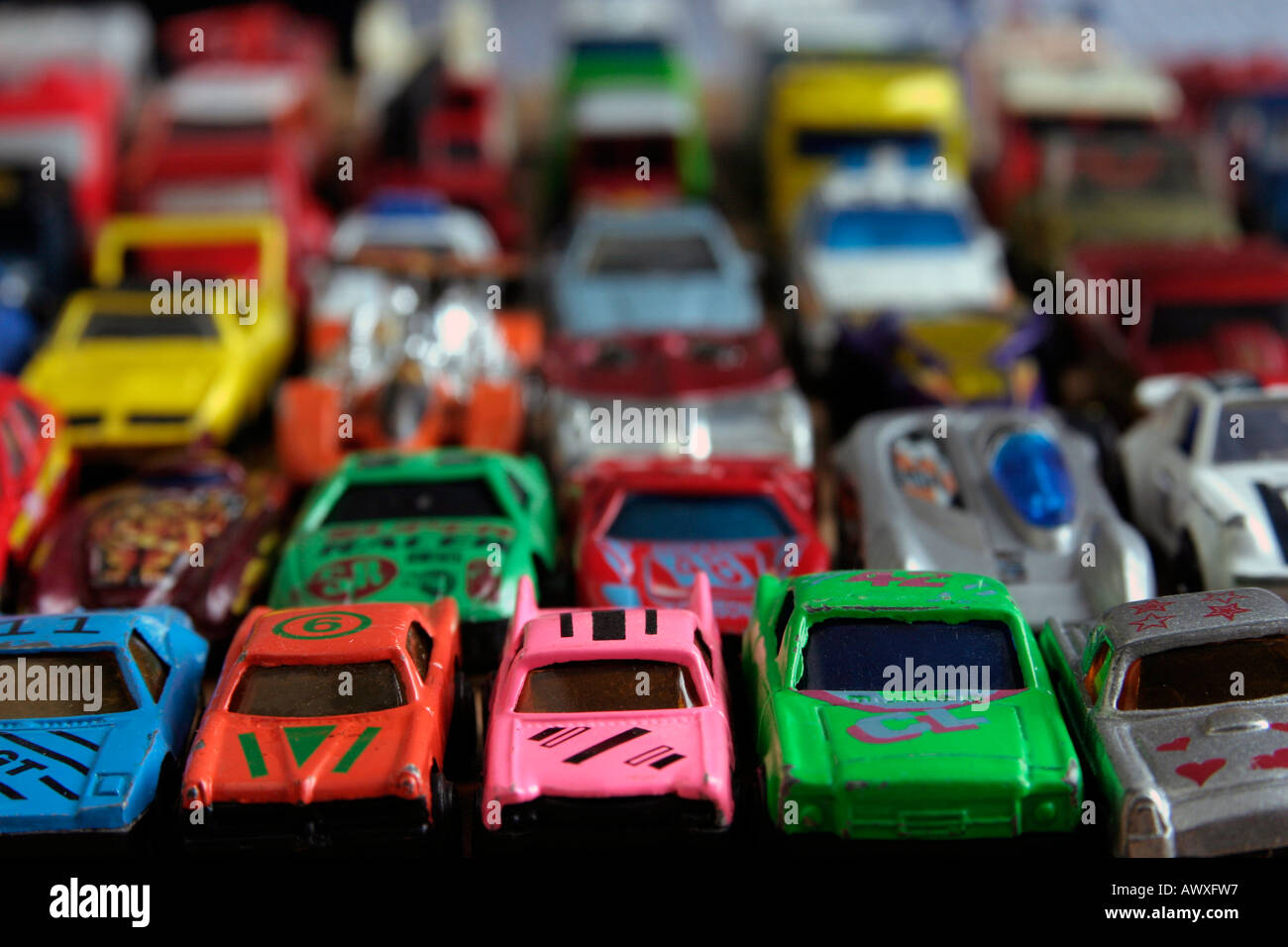 rows of toy cars packed together Stock Photo - Alamy