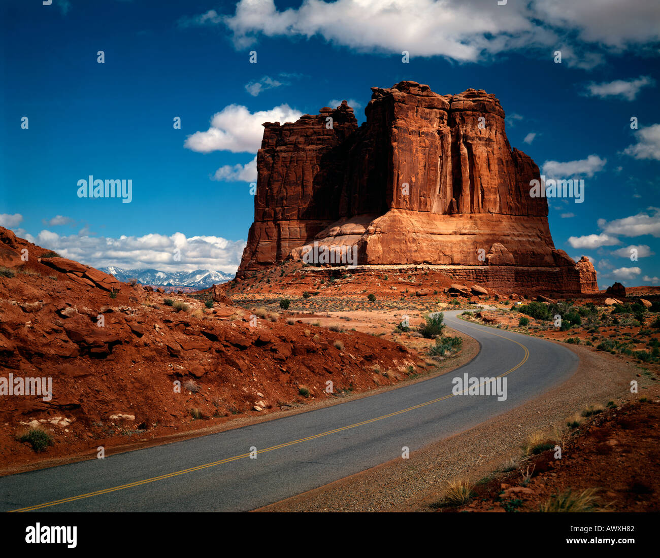 Gigantic monolithic rock formation rises to the sky in Arches National ...