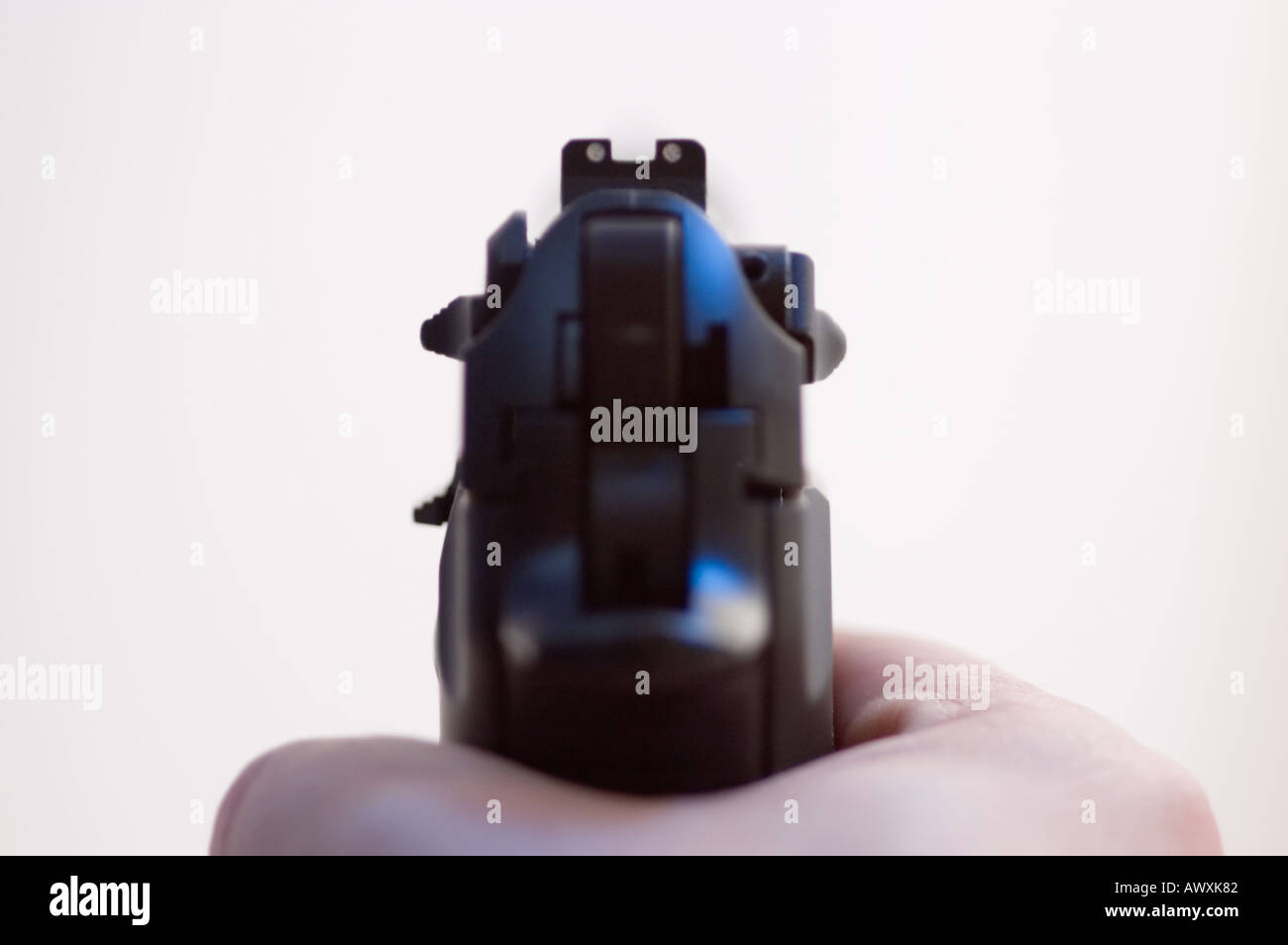 Man aiming gun Stock Photo - Alamy