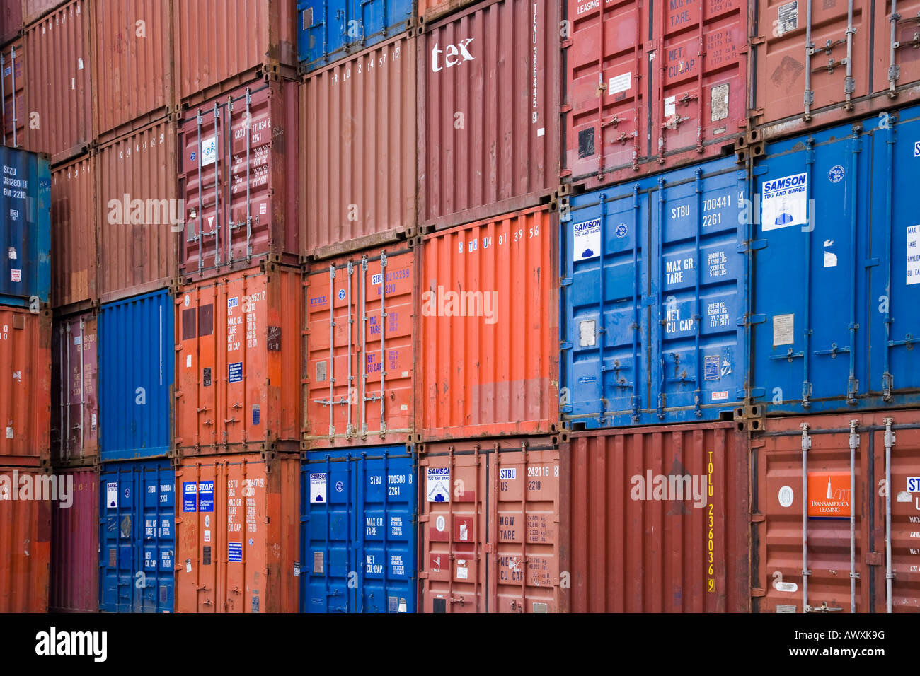 containers stacked at storage facility Stock Photo - Alamy