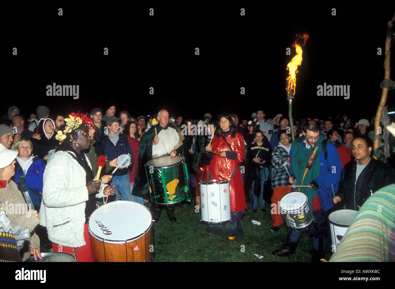 Druids dancing during the summer solstice at Stonehenge stone circle ...