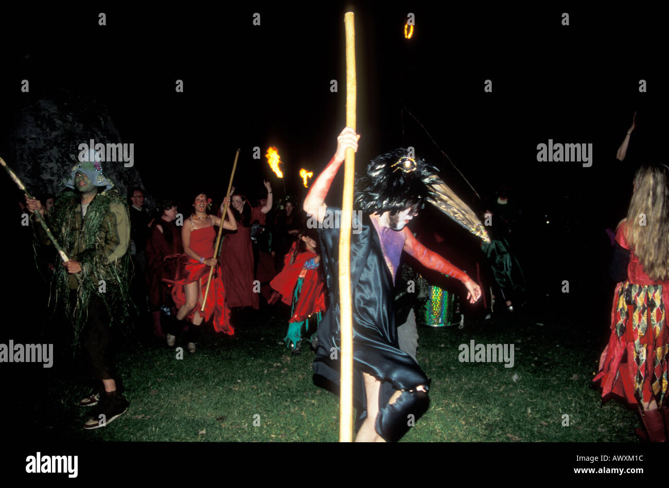Druids dancing during the summer solstice at Avebury stone circle in ...