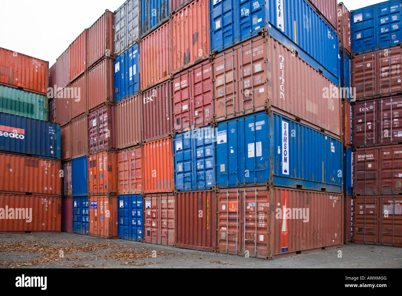 containers stacked at storage facility Stock Photo - Alamy