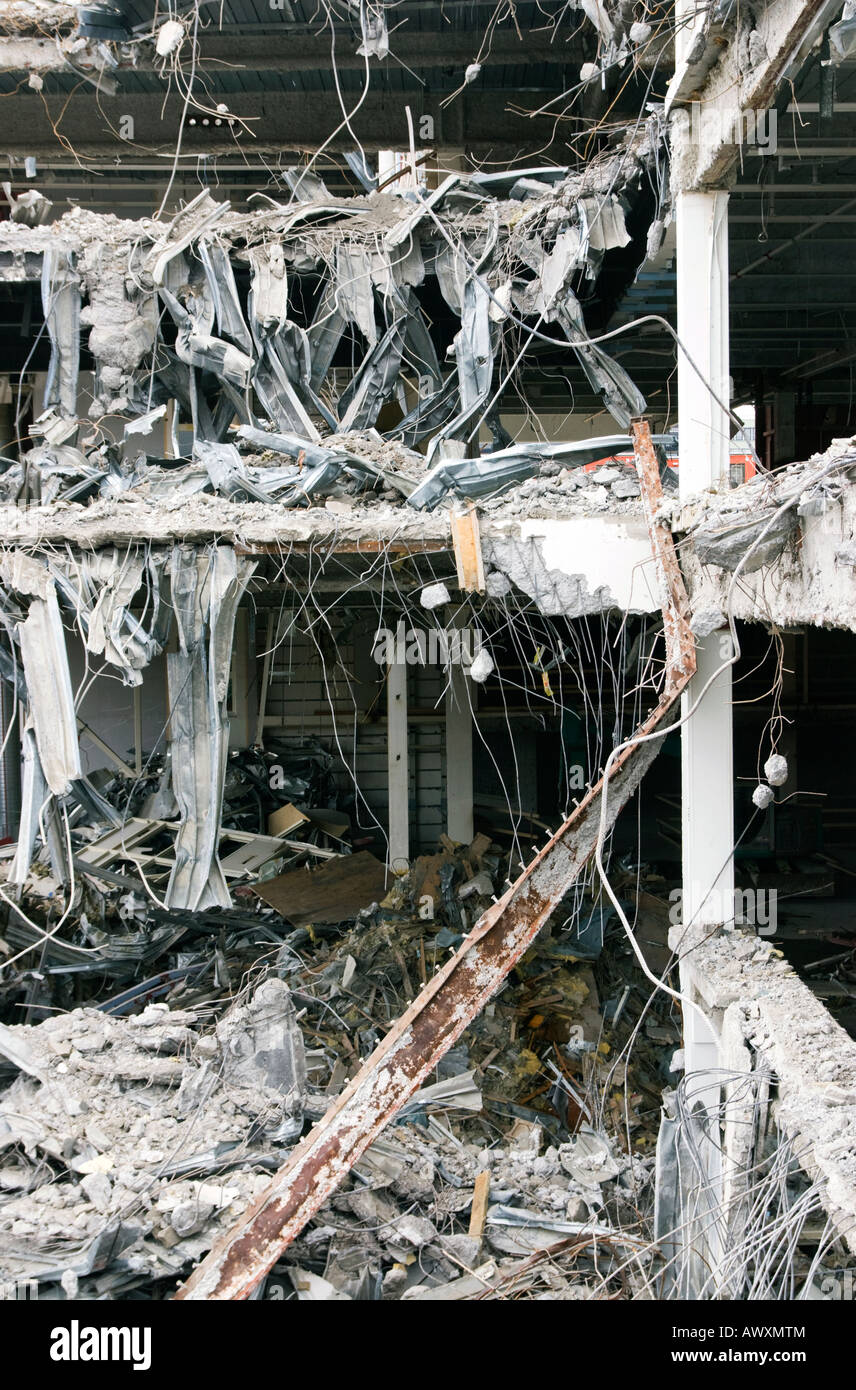 Demolished building with exposed floors and concrete rubble Stock Photo ...