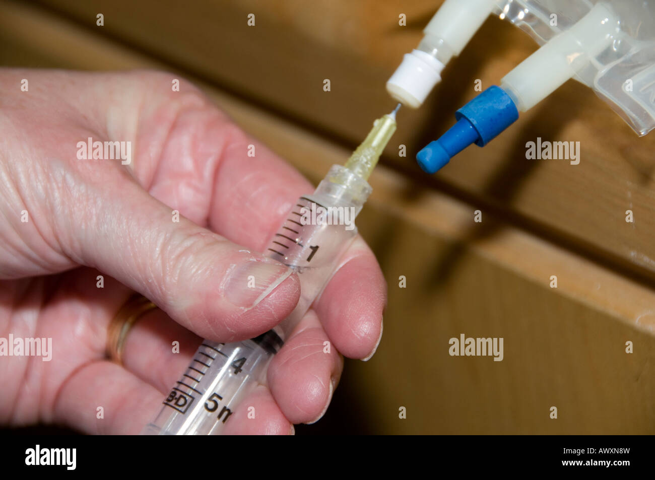 Nurse Preparing IV Medication For Patient Stock Photo - Alamy