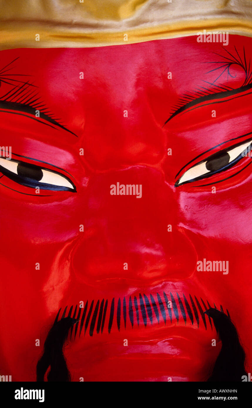 Bright red Chinese mask Stock Photo - Alamy
