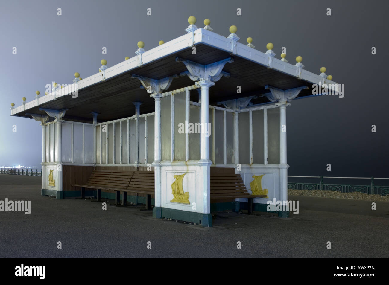Public shelter and Benches Brighton seafront at Night Stock Photo - Alamy