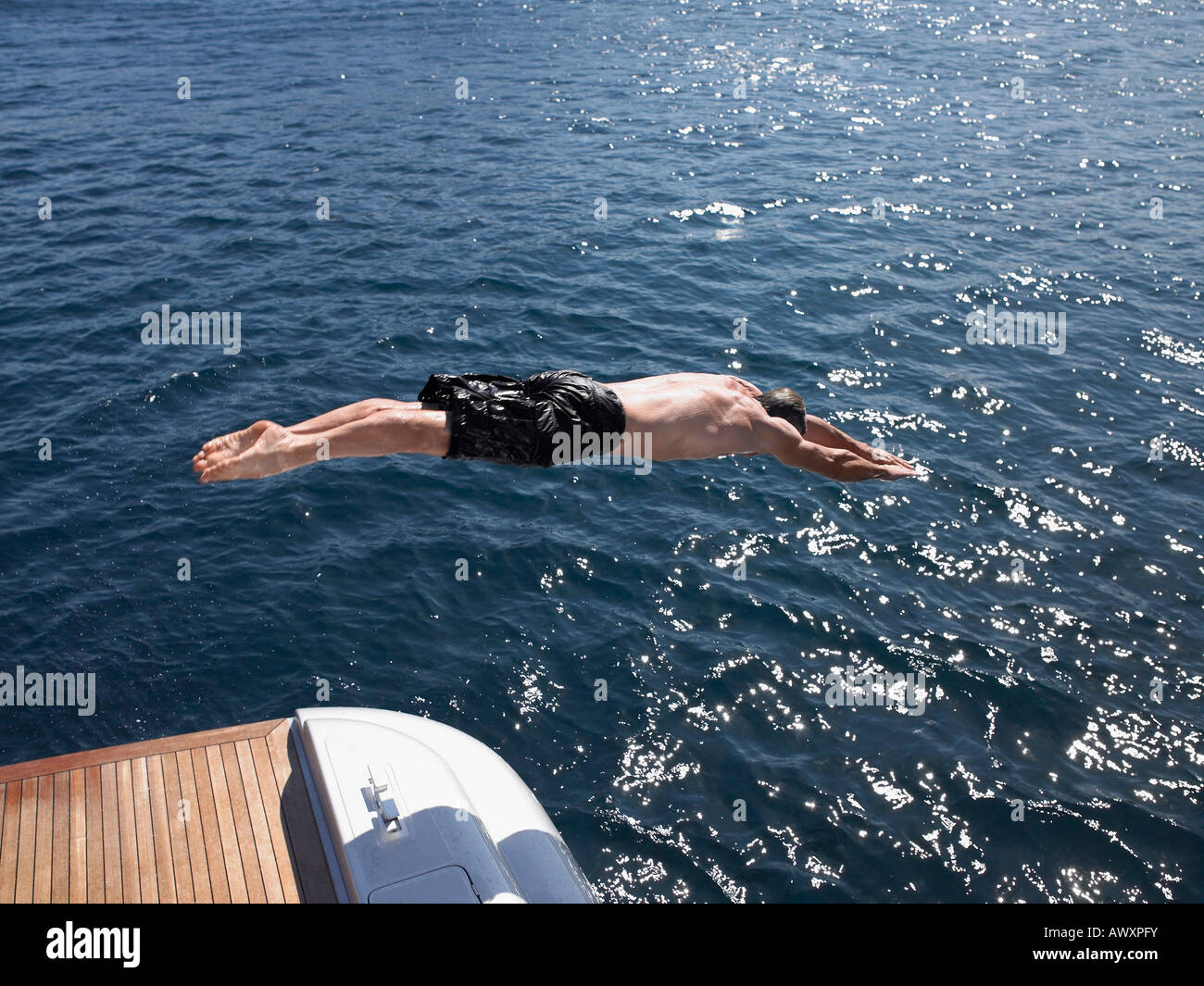 Man Diving in Water Stock Photo - Alamy