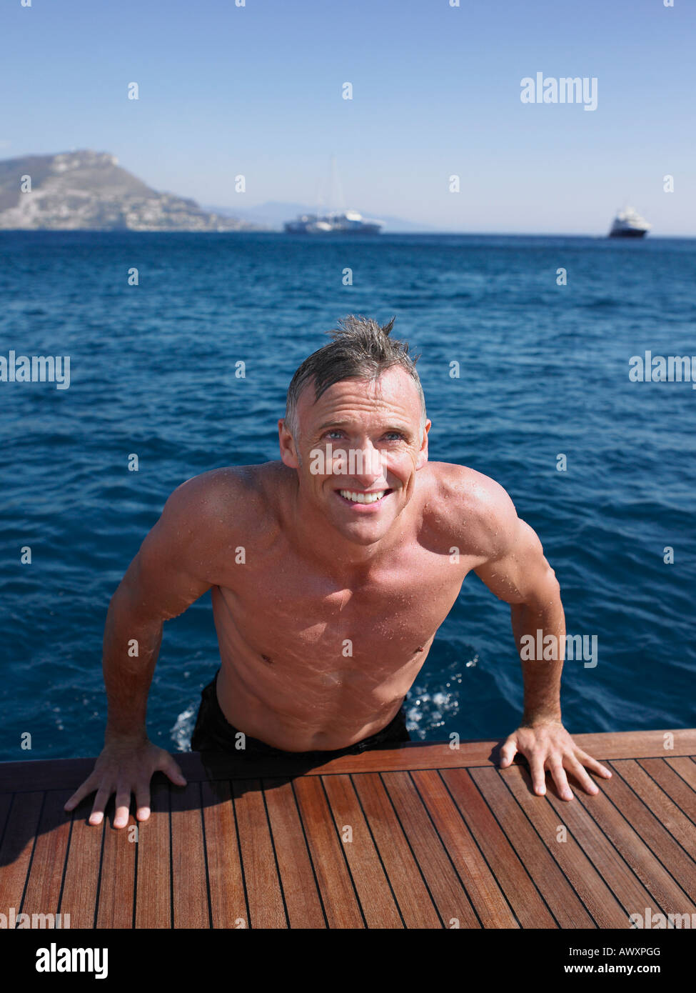 Middle age man swimming hi-res stock photography and images - Alamy