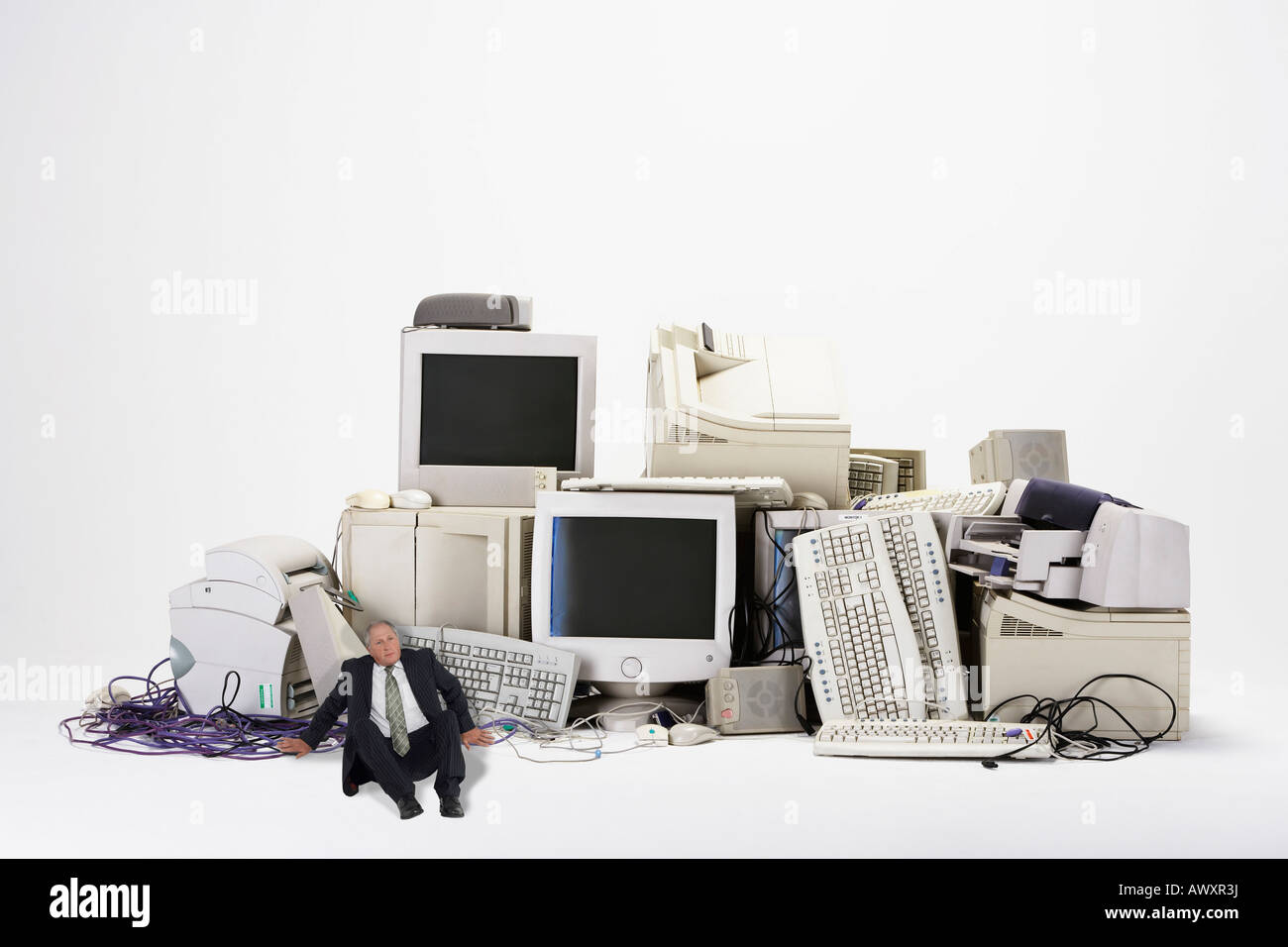 Businessman Next to Old Computers Stock Photo - Alamy