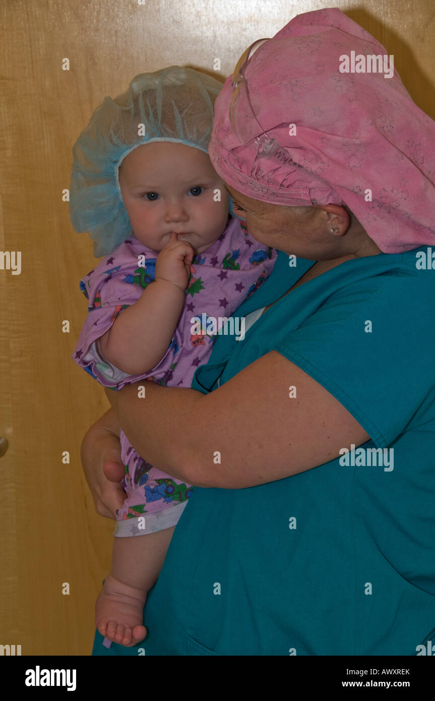 Nurse And Baby Patient Ready For Surgery Stock Photo - Alamy