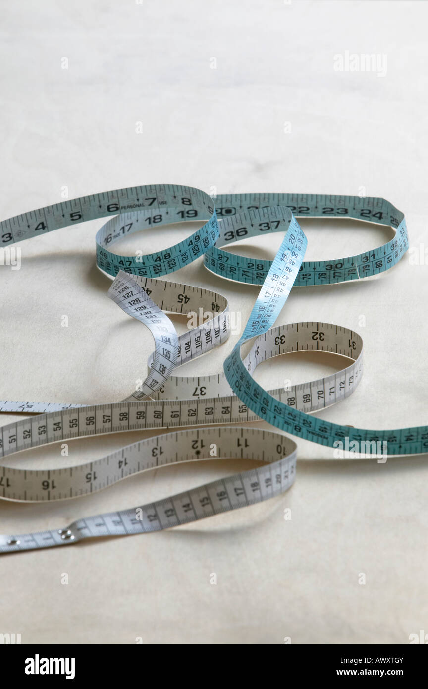 Measuring tape on table Stock Photo - Alamy