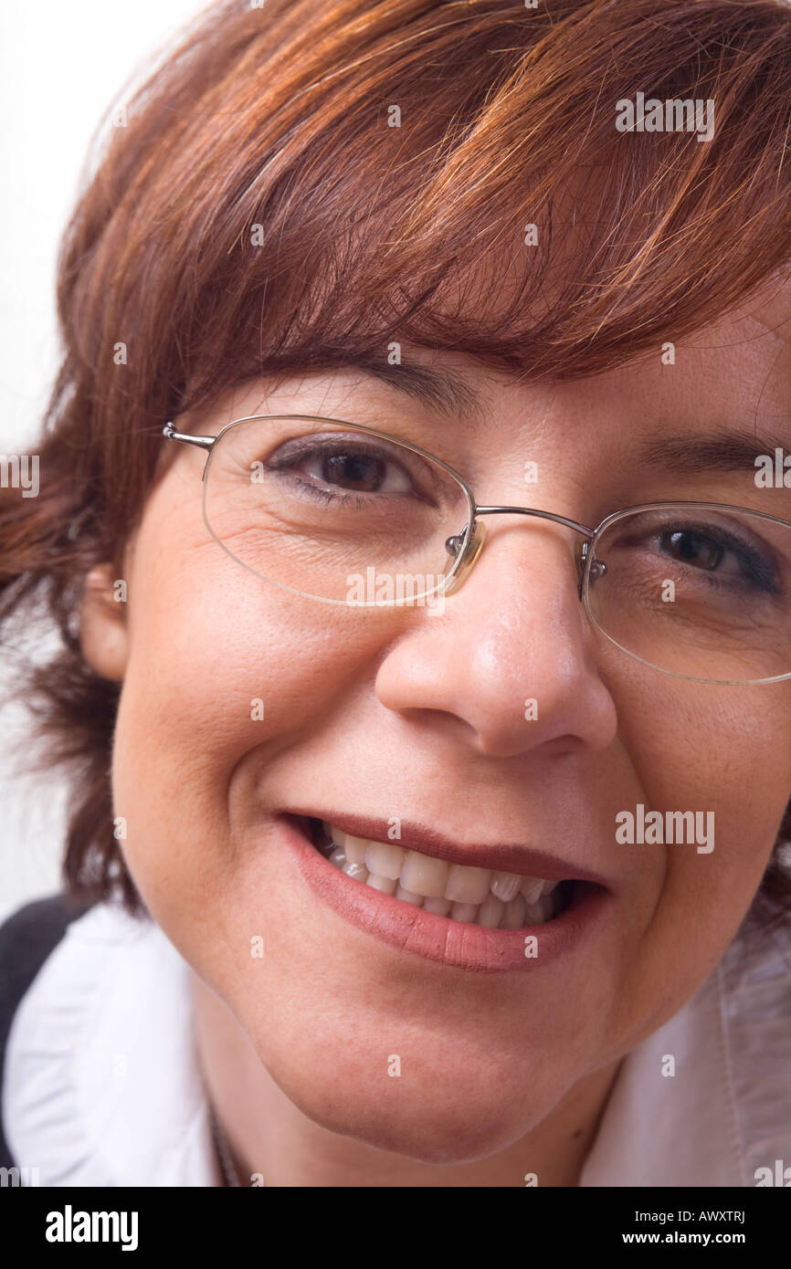 Serene 40 years old woman smiling confidently Stock Photo - Alamy