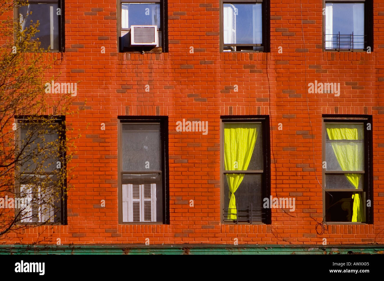vivid orange brick residential building in New York City with bright ...