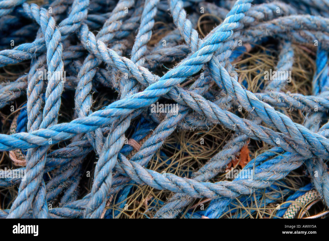 Pile of rope laying on a quayside Stock Photo - Alamy