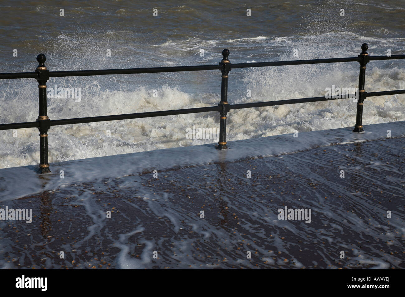 Water crashing over rail Stock Photo - Alamy