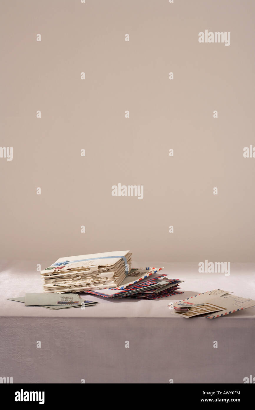 Stack of letters on table Stock Photo - Alamy