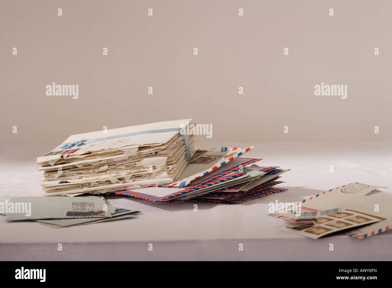 Stack of letters on table Stock Photo - Alamy