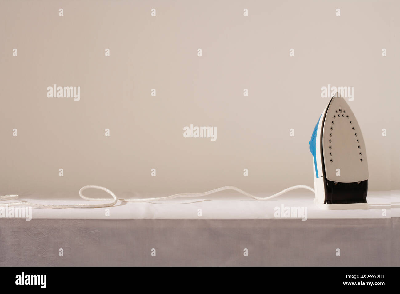 Iron on table Stock Photo - Alamy