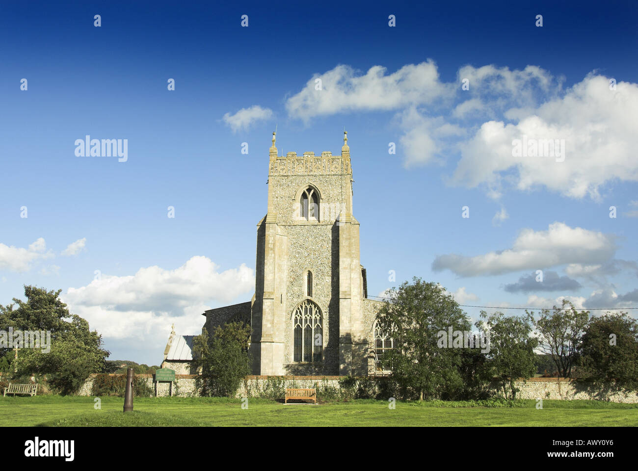 Village Church with blue sky and white clouds St Marys Church Wiveton ...