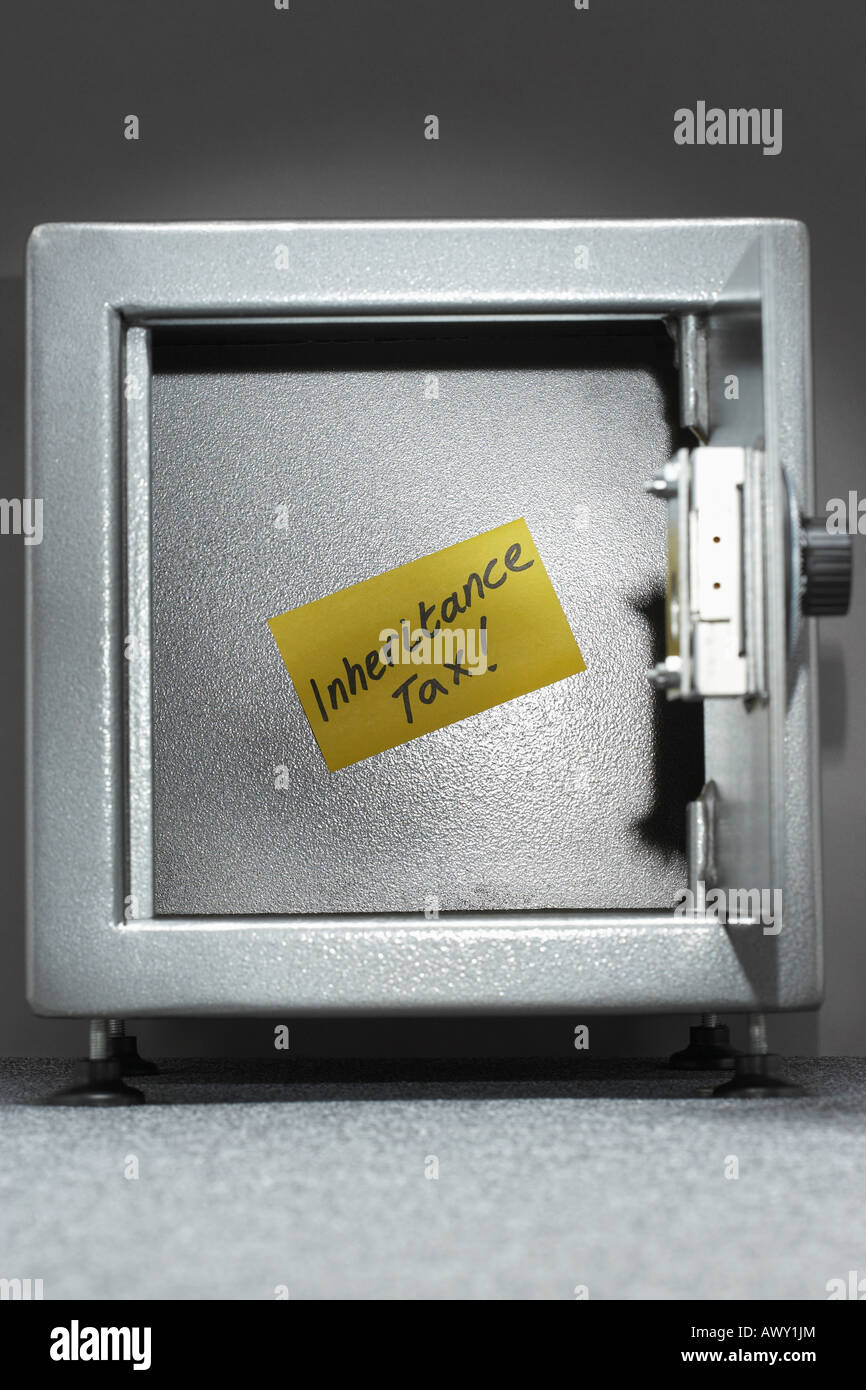 Safe with sticky note reading 'inheritance tax' Stock Photo - Alamy