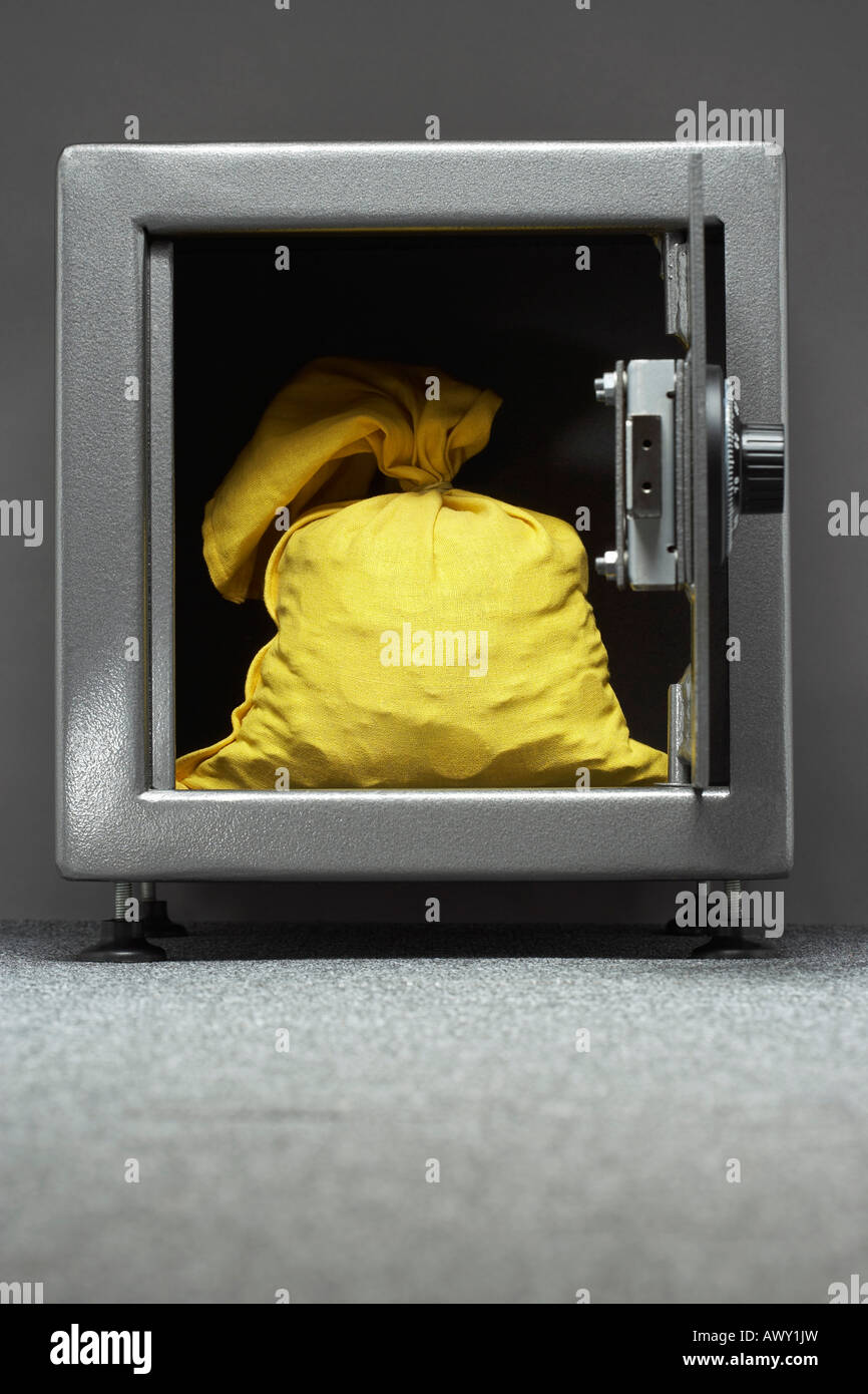 Yellow sack in safe Stock Photo - Alamy