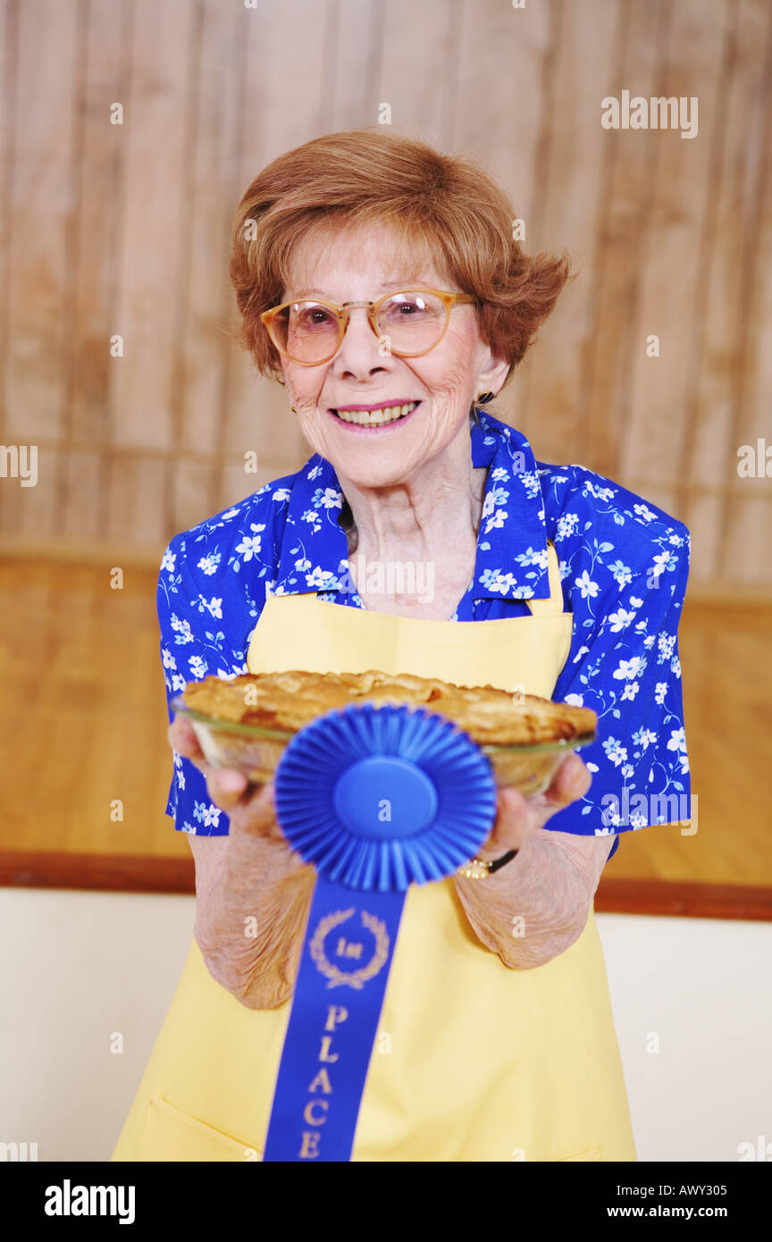 Woman holding her award winning pie Stock Photo - Alamy