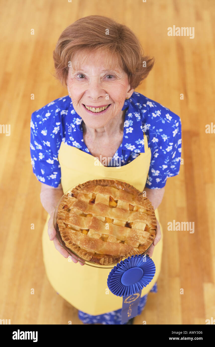 Woman holding her award winning pie Stock Photo - Alamy
