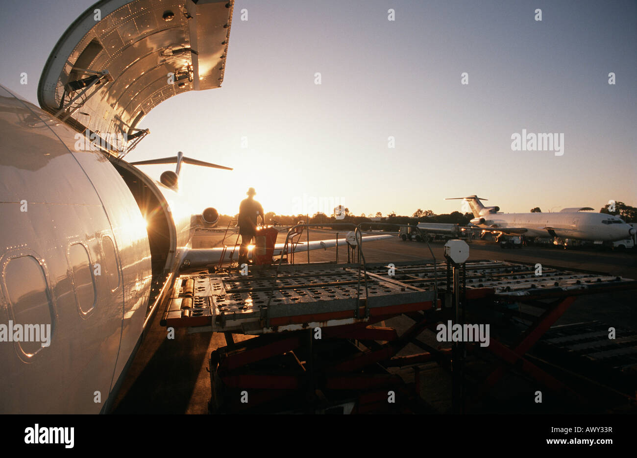 Loading freight onto Boeing 727 jet aircraft Stock Photo - Alamy