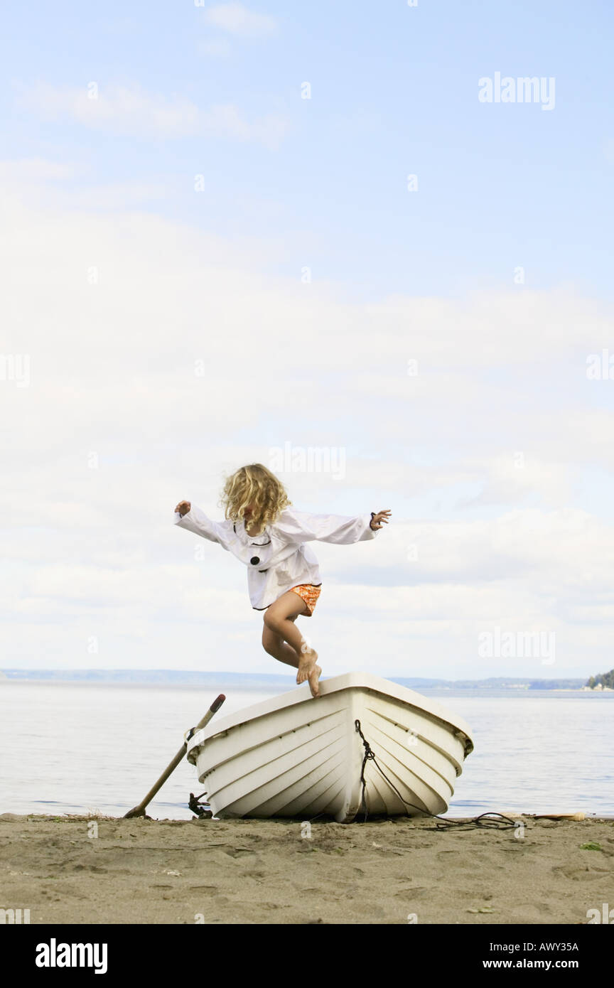 Girl jumping off dock lake hi-res stock photography and images - Alamy