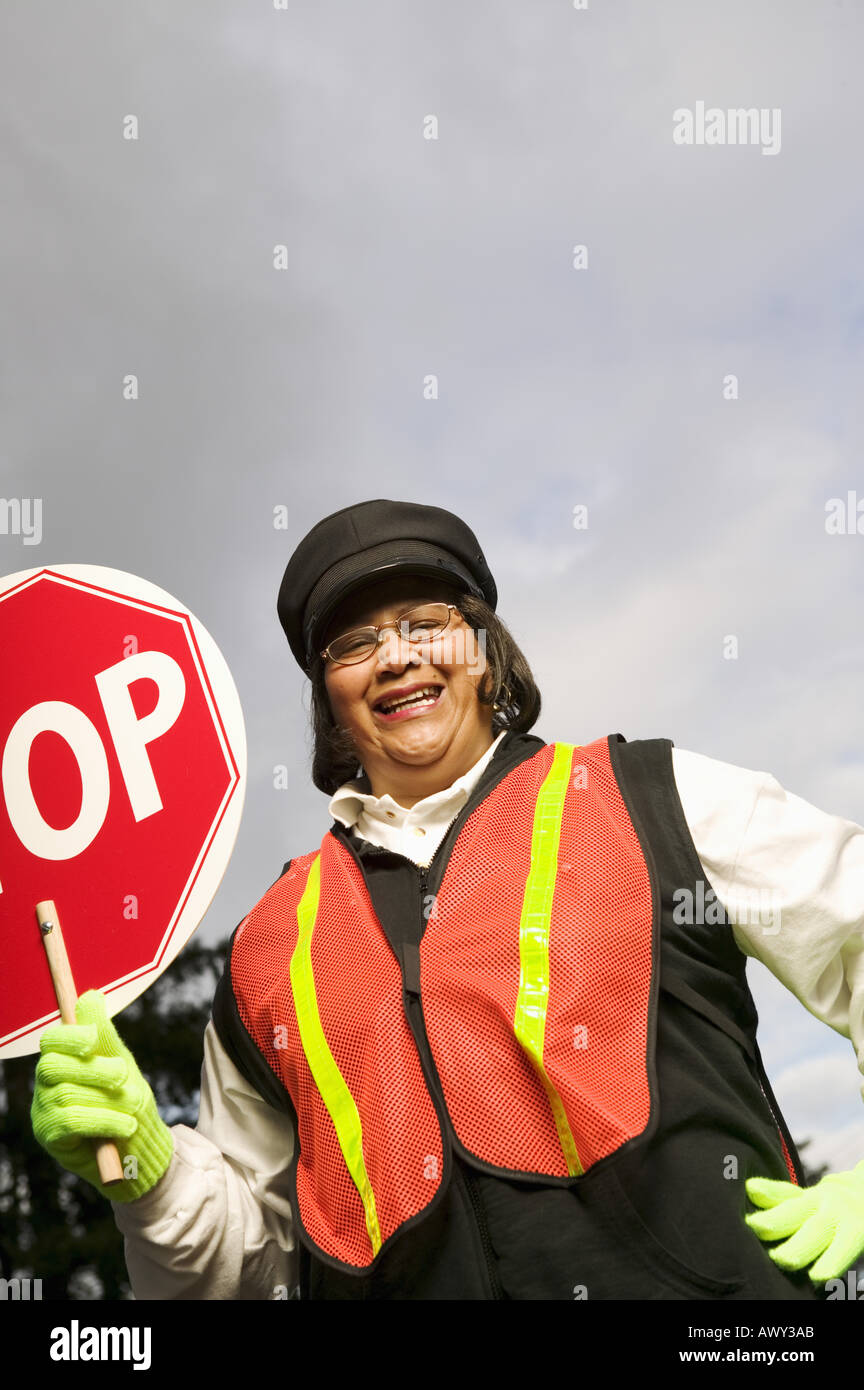 A female crossing guard Stock Photo - Alamy